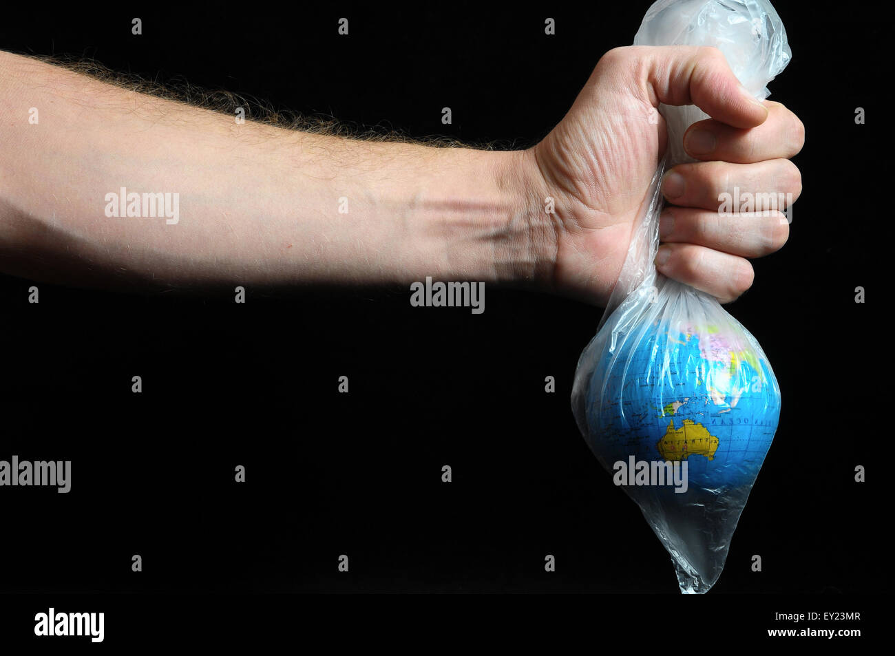 Trapped Planet Earth and an Hand Stock Photo - Alamy