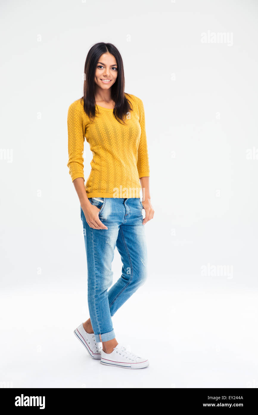 Full length portrait of a happy beautiful woman posing isolated on a ...