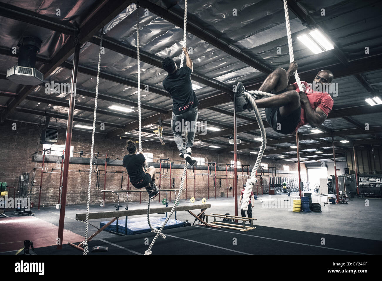 Women climbing rope High Resolution Stock Photography and Images - Alamy