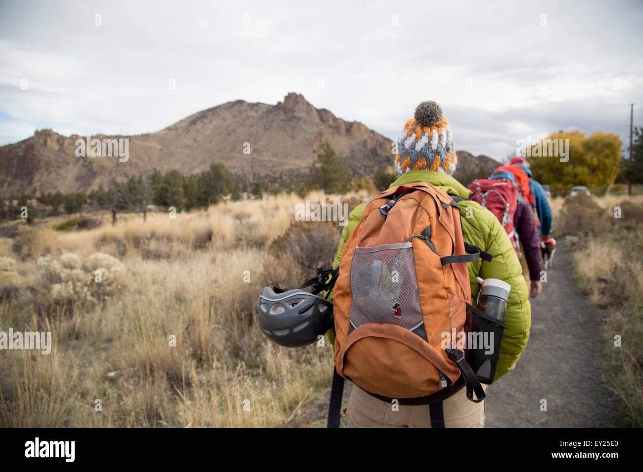 Hikers walking on track, Smith Rock State Park, Oregon, US Stock Photo ...