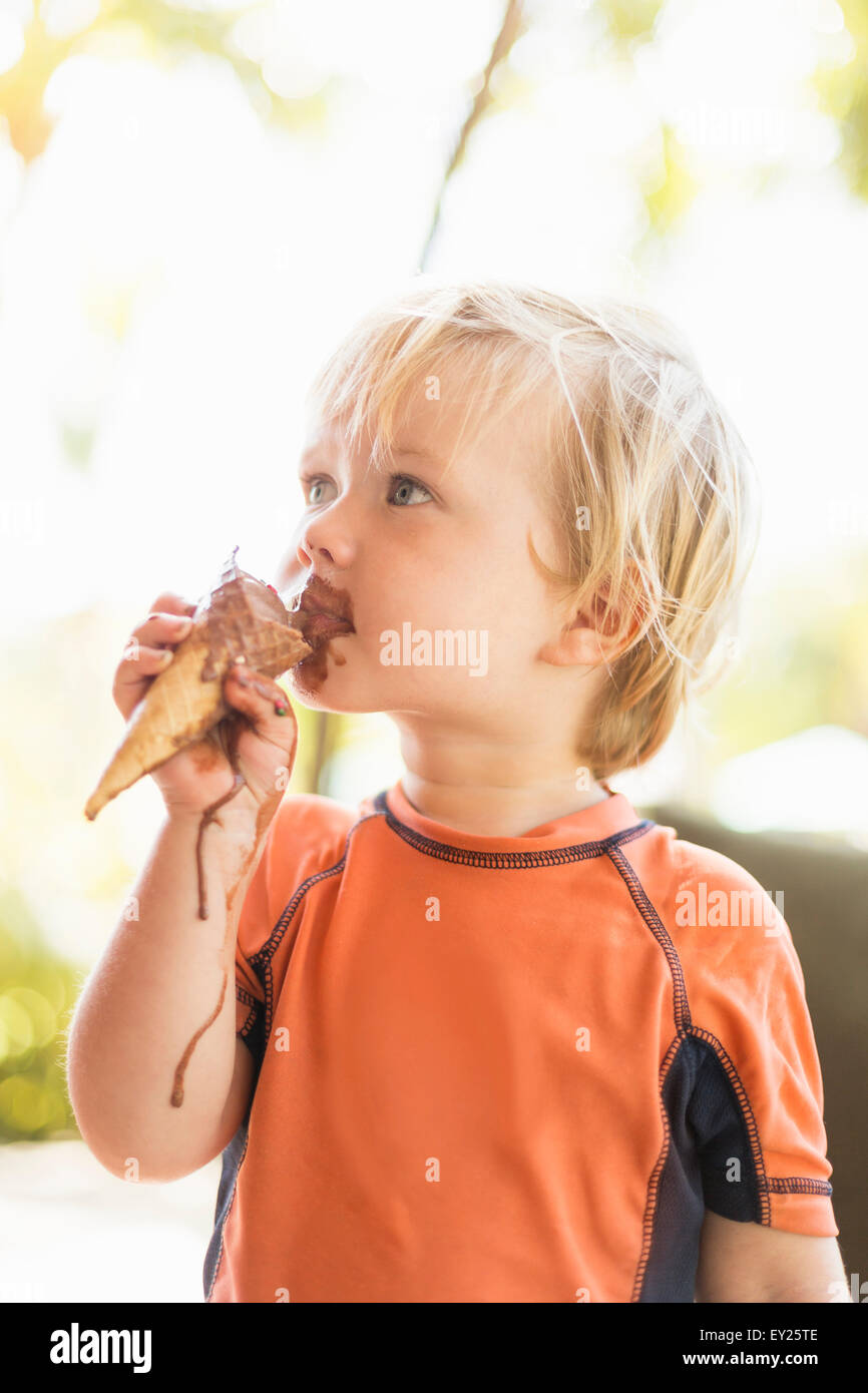Boy with ice cream cone hi-res stock photography and images - Alamy