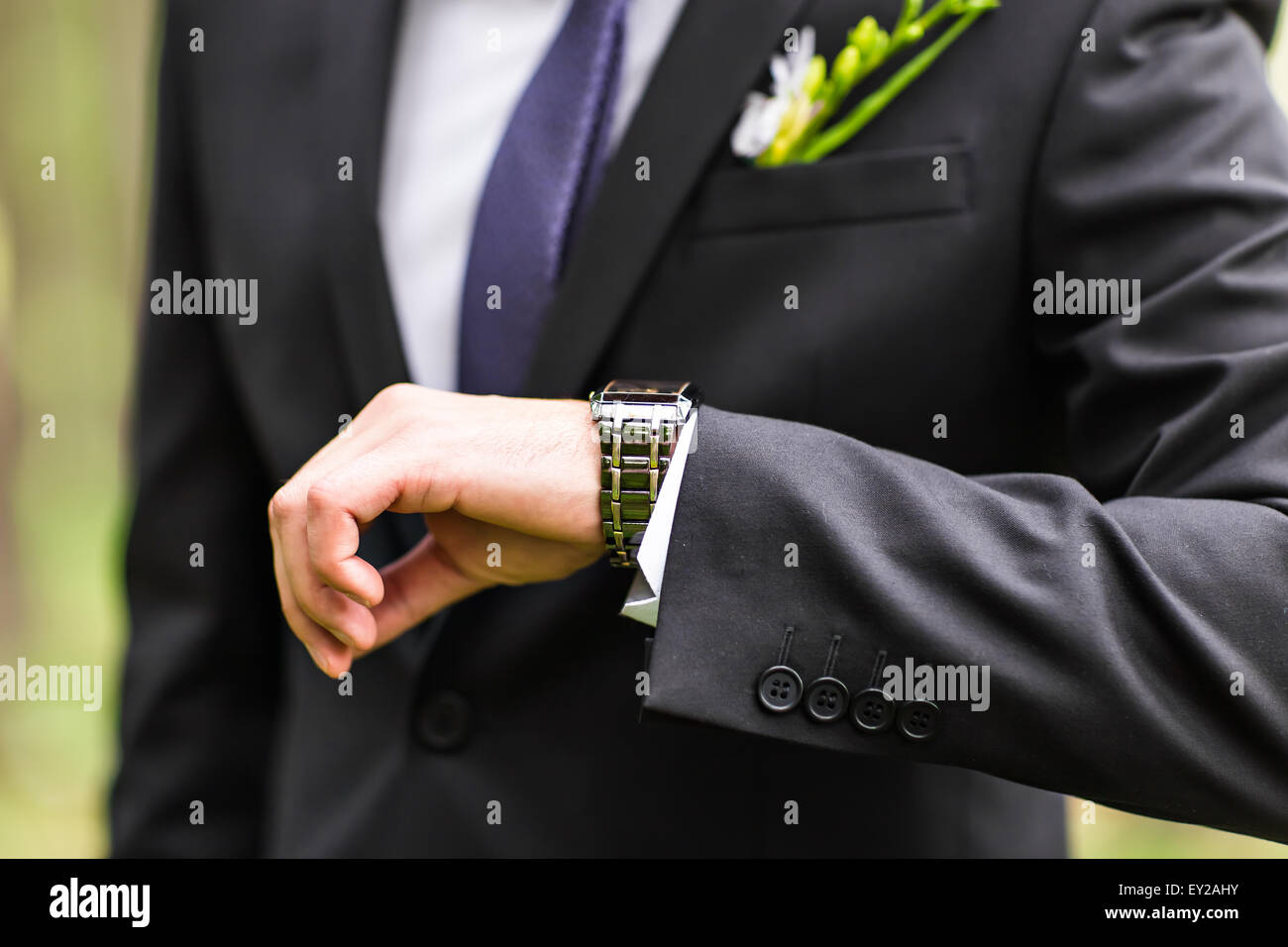 young business man looking at watch over white background Stock Photo ...