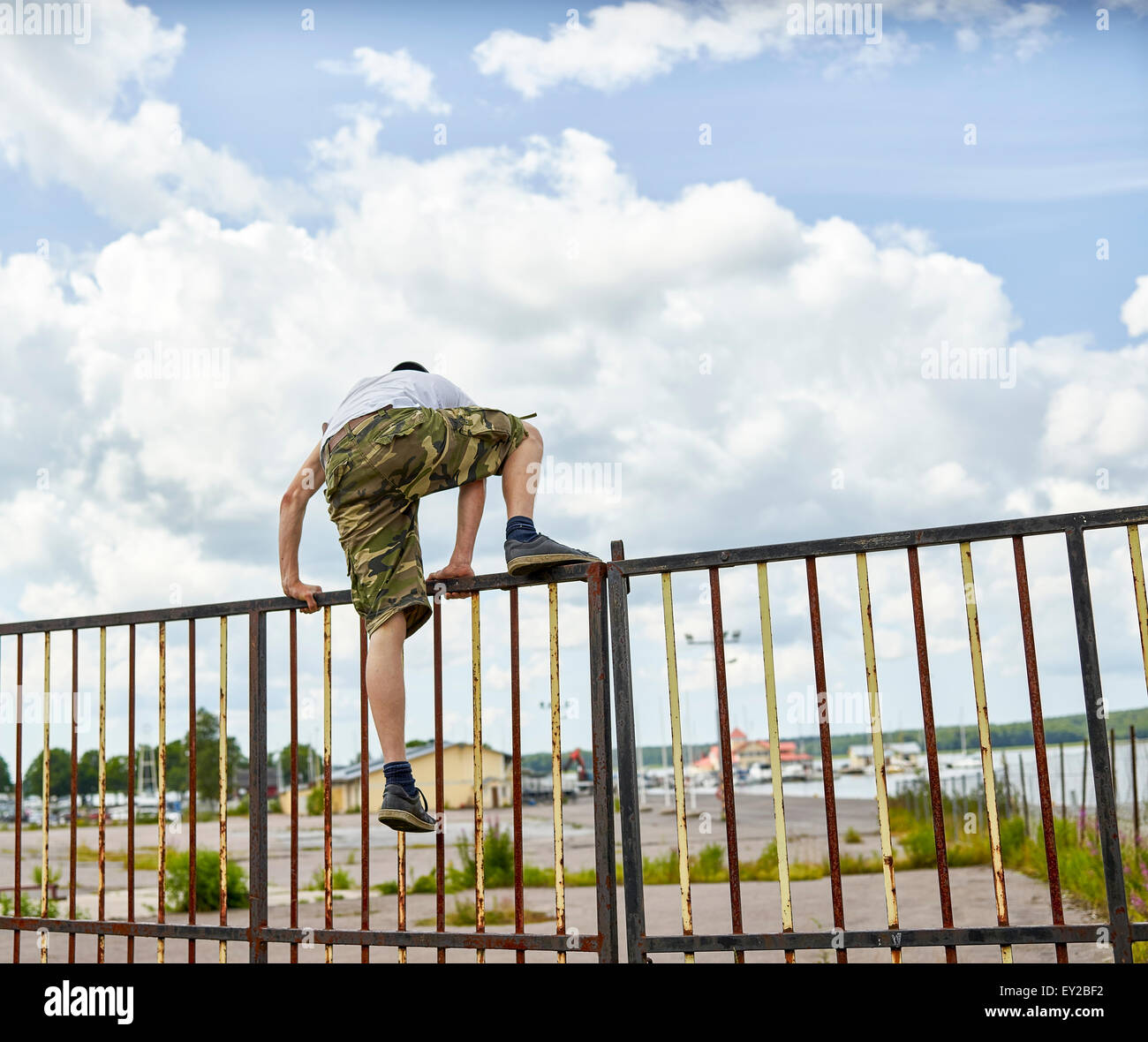 Climb over fence hi-res stock photography and images - Alamy