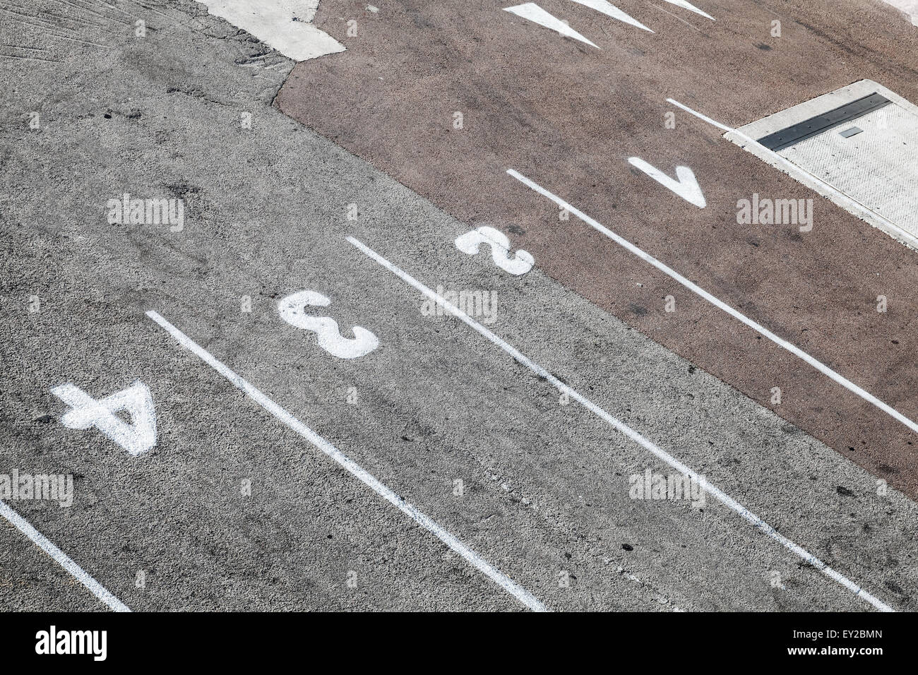 Ferry terminal loading port area, road marking with lane numbers and ...