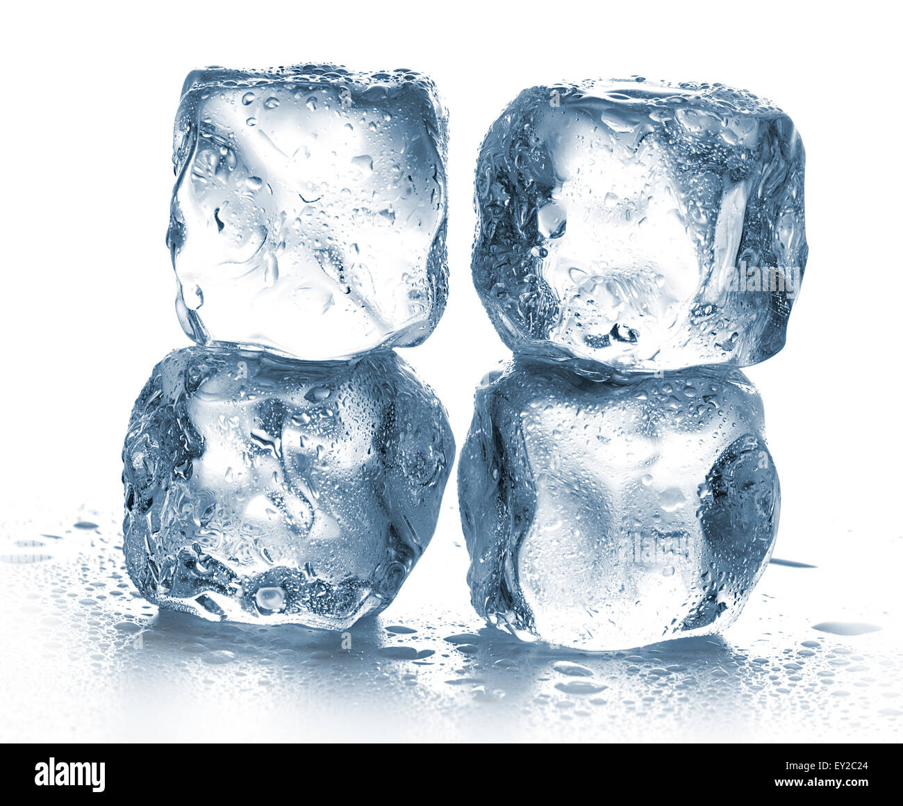 ice cubes with water drops close-up isolated on a white background ...