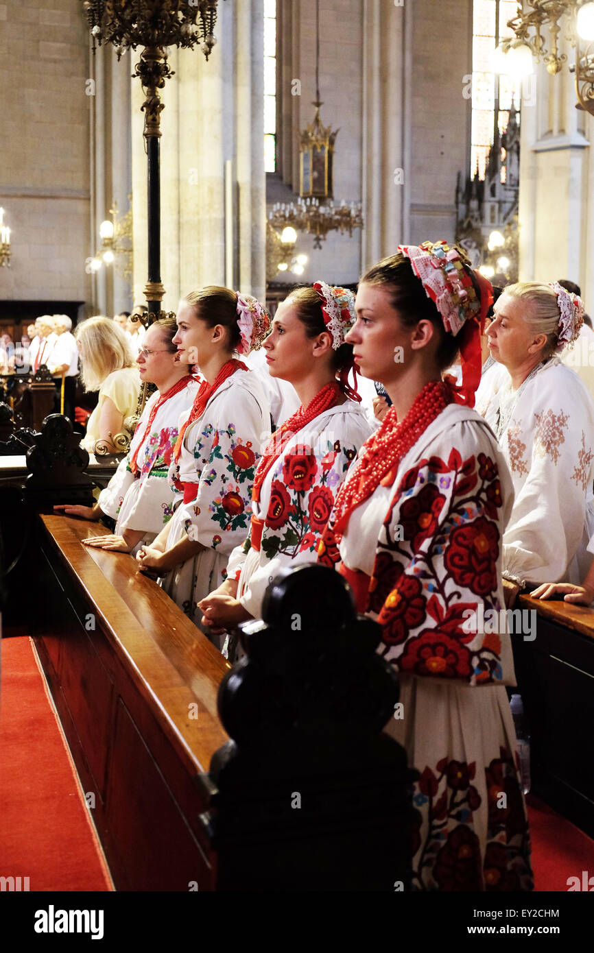 Participants in the 49th International Folklore Festival at Sunday Mass ...