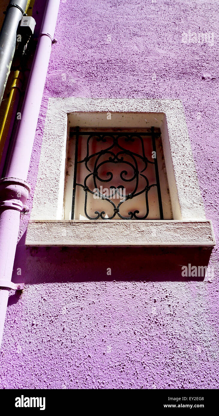 Window frame in Burano on purple color wall building architecture ...