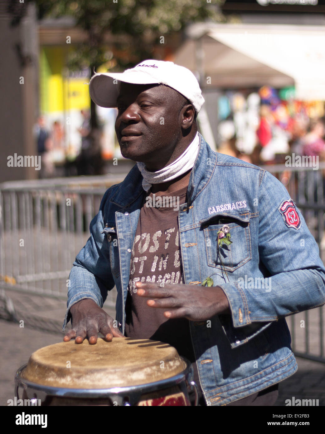 African man playing drums hi-res stock photography and images - Alamy