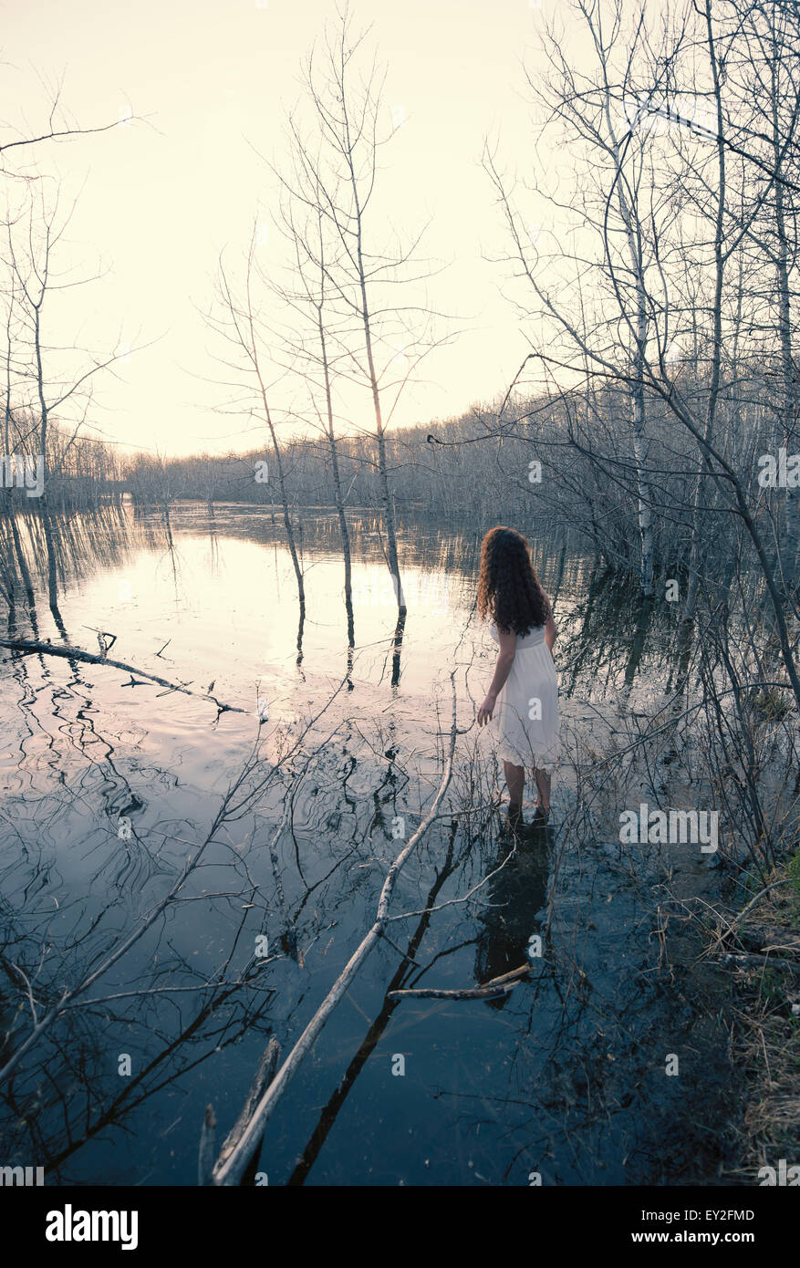 Young woman wading hi-res stock photography and images - Alamy