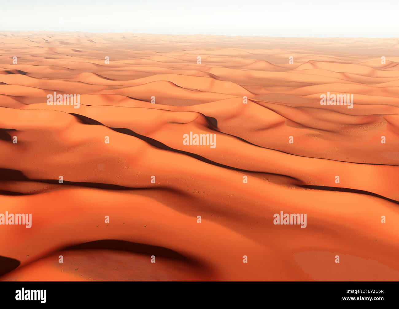 Expanse of desert with orange dunes Stock Photo - Alamy