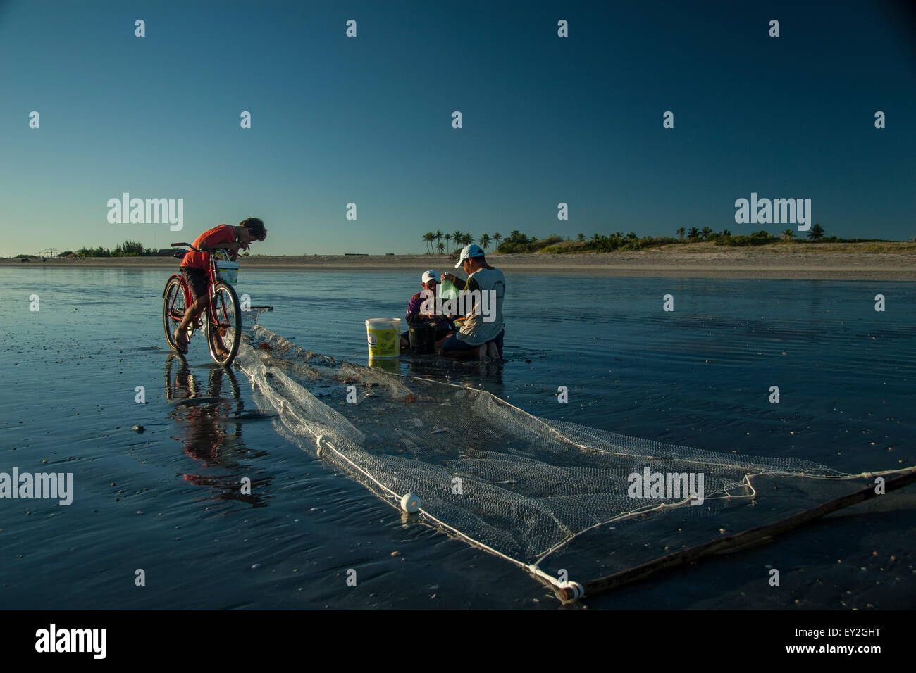 Fishermen having a break in Preá Beach, Jericoacoara, Ceará, Brazil ...