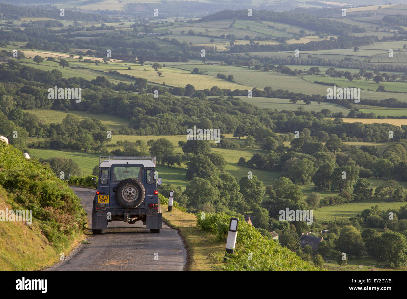 Land Rover Defender on a scenic narrow road descending off the Long ...