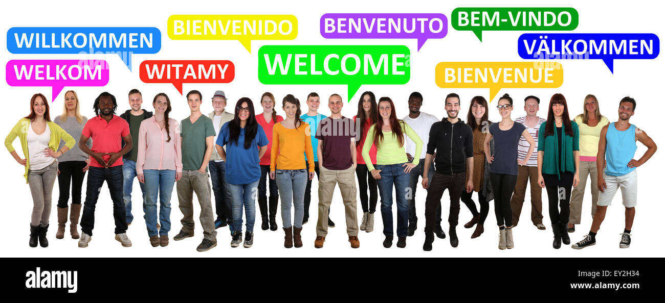 Multi ethnic group of smiling young people saying welcome in different ...