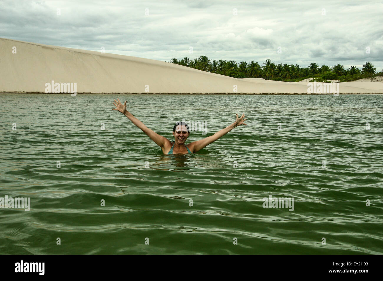 woman swimming in a paradise among dunes in Preá Beach, Jericoacoara ...