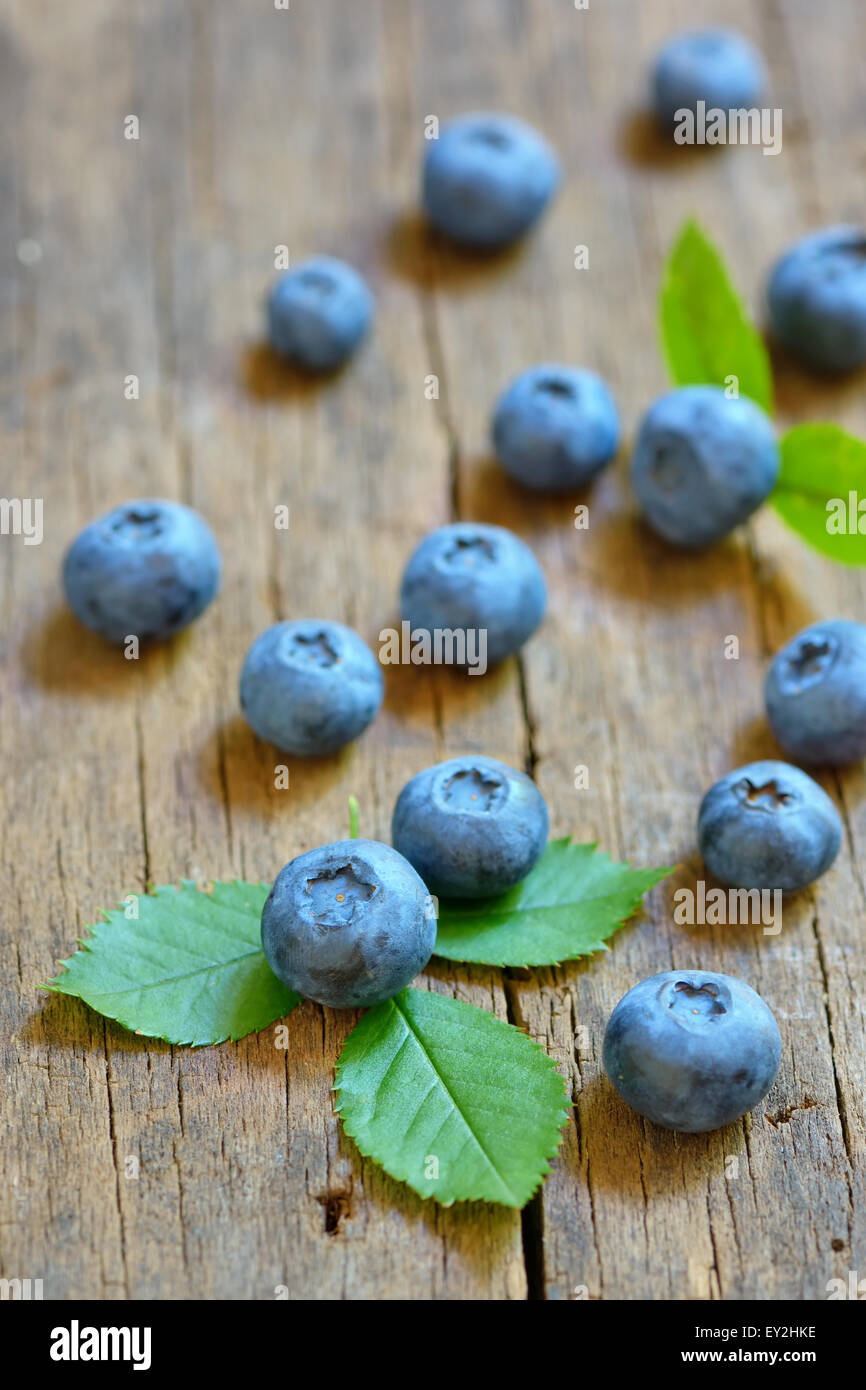 Blueberry on old table wood Stock Photo - Alamy