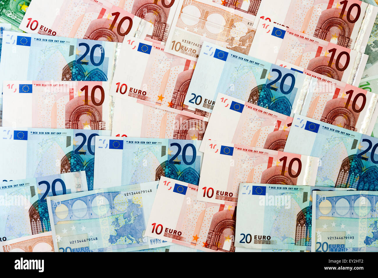Edge to edge scattered Euro banknotes all showing the obverse, front ...