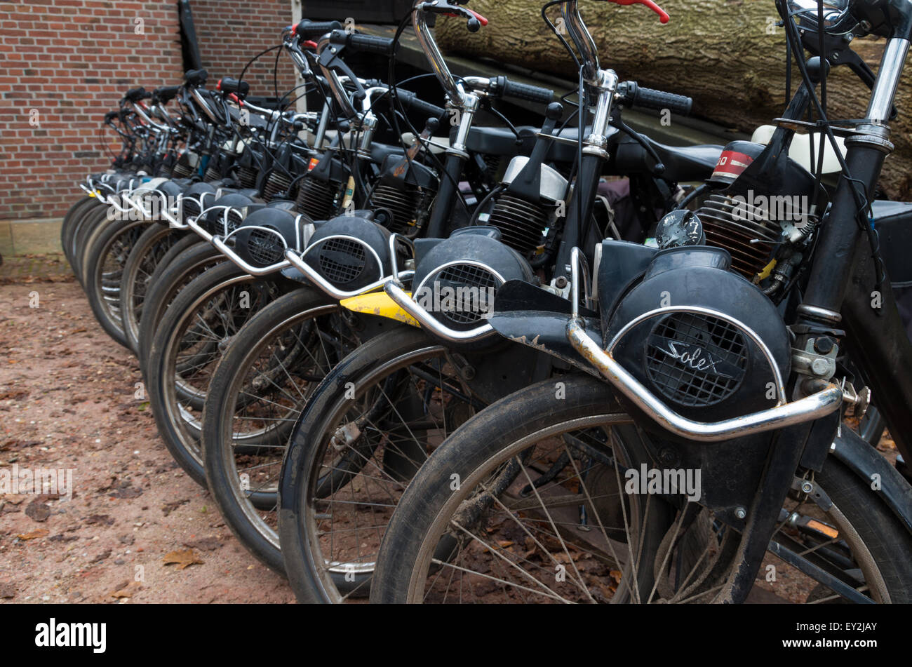 DENEKAMP, NETHERLANDS - NOVEMBER 15, 2014: Row of vintage Solex mopeds ...