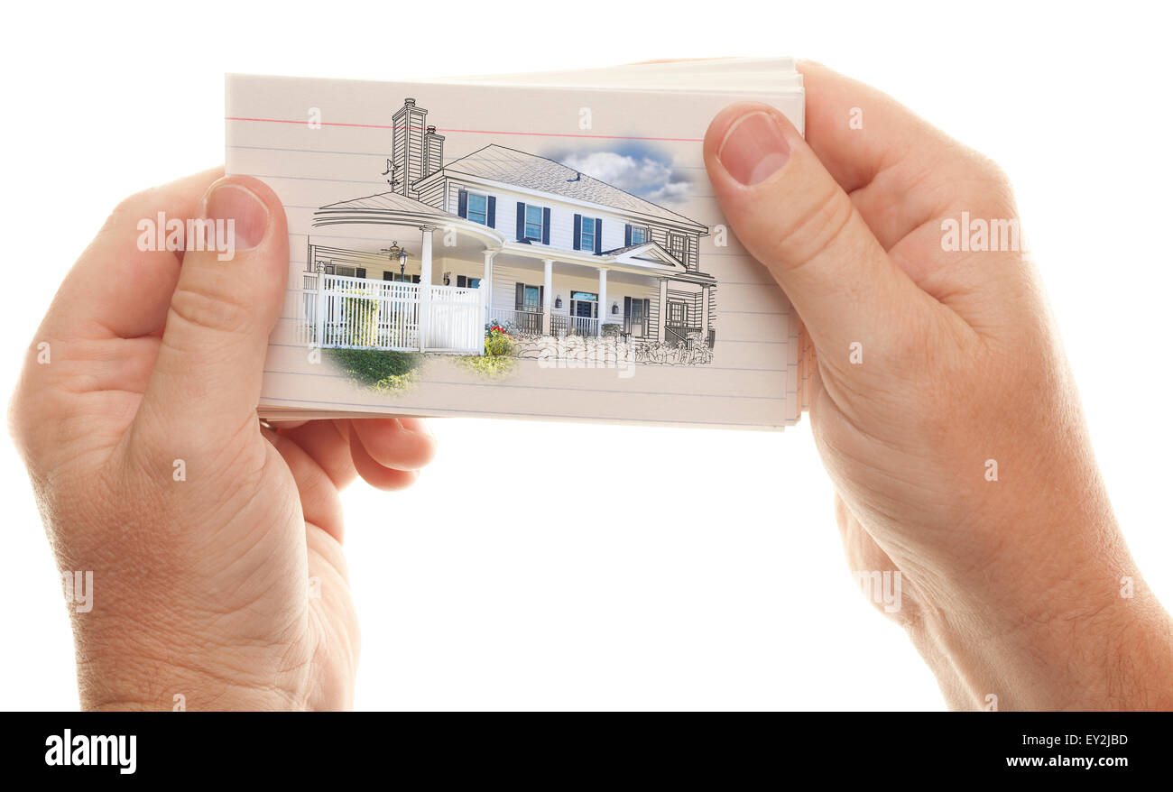 Male Hand Holding Stack Of Flash Cards With House Drawing Isolated On A White Background Stock