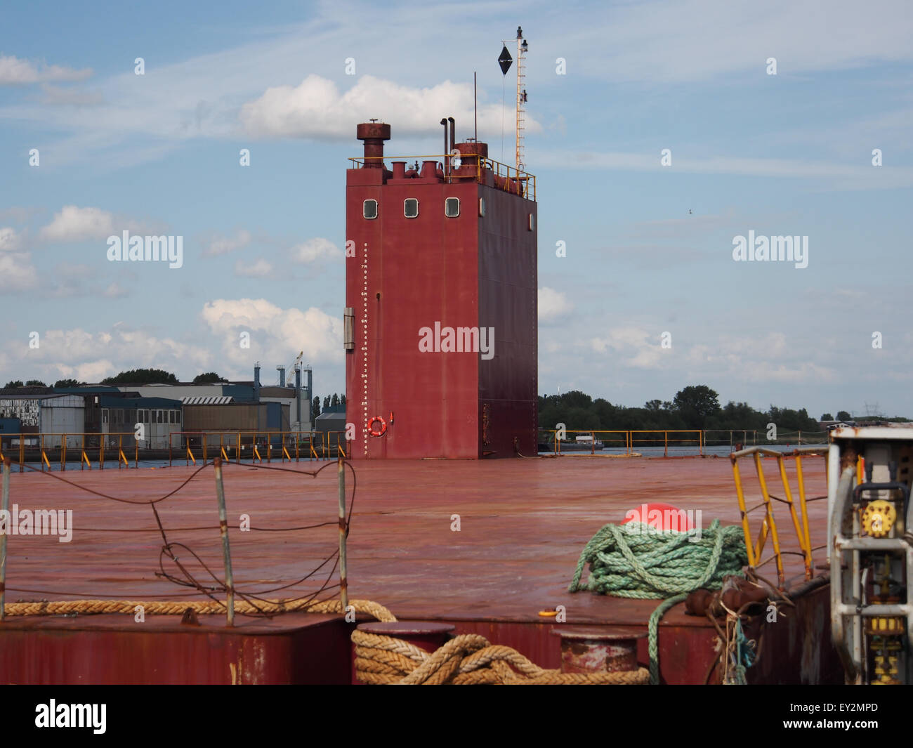 Dina Launcher, a container ship and oil tanker, navigates the Nieuwe ...