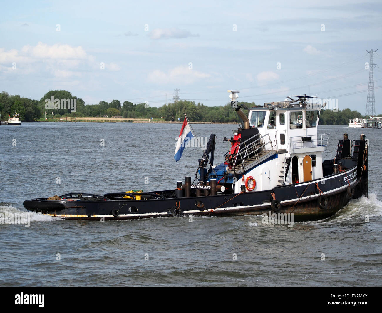 Groenland, a container ship and oil tanker, operates on the Nieuwe Maas ...