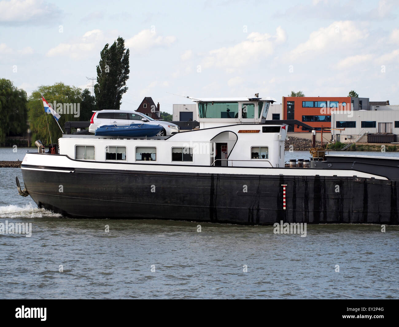 Patria, a container ship and oil tanker, operates on the Nieuwe Maas ...