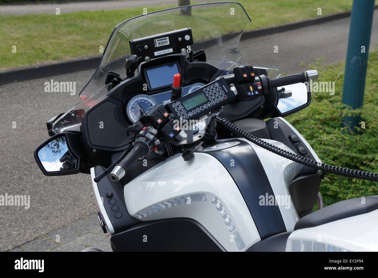 A BMW R1200RT police motorbike, Unit 66-51, is shown in this image ...