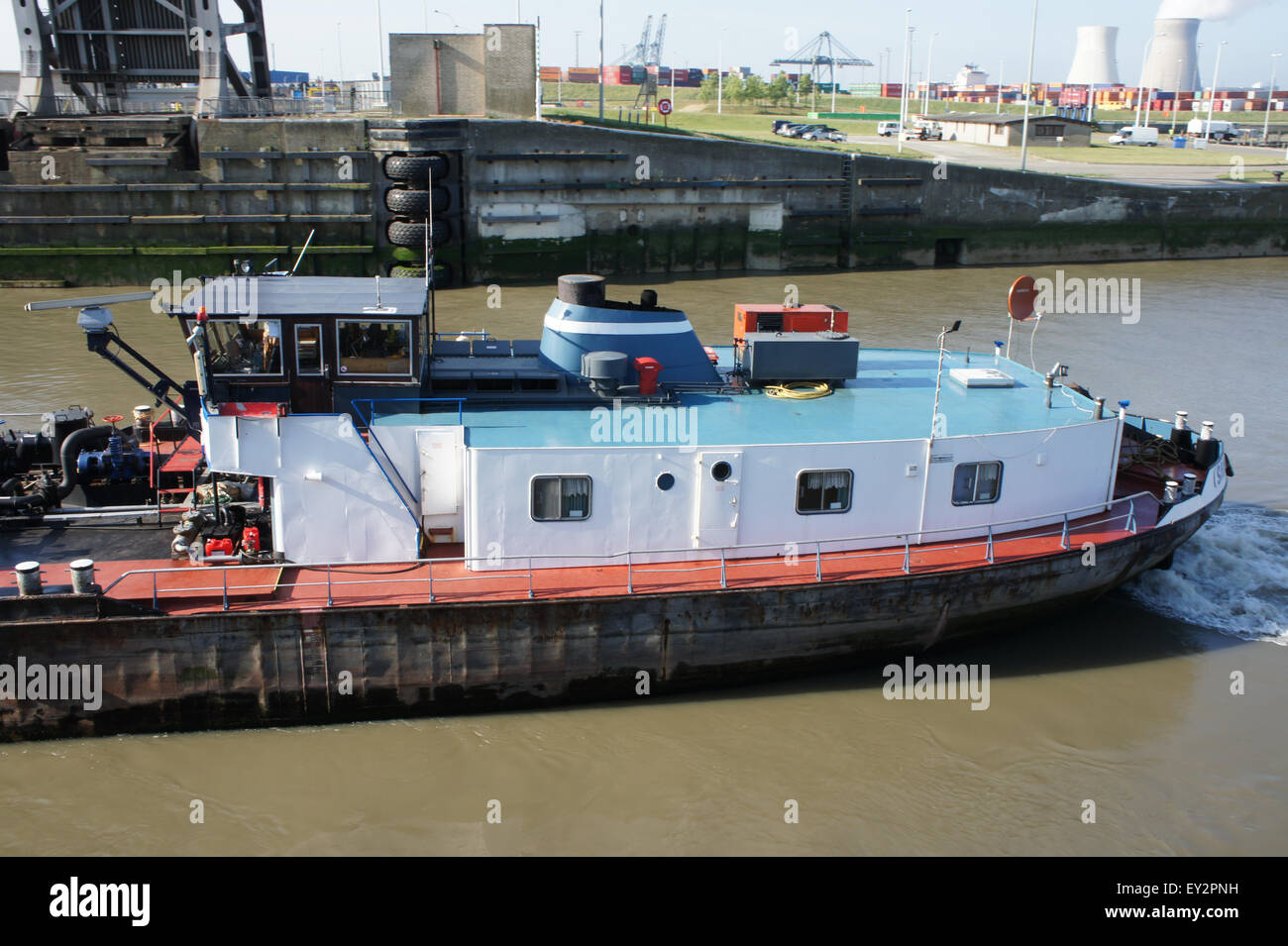 The Sam, a container ship and oil tanker, is docked at Zandvlietsluis ...