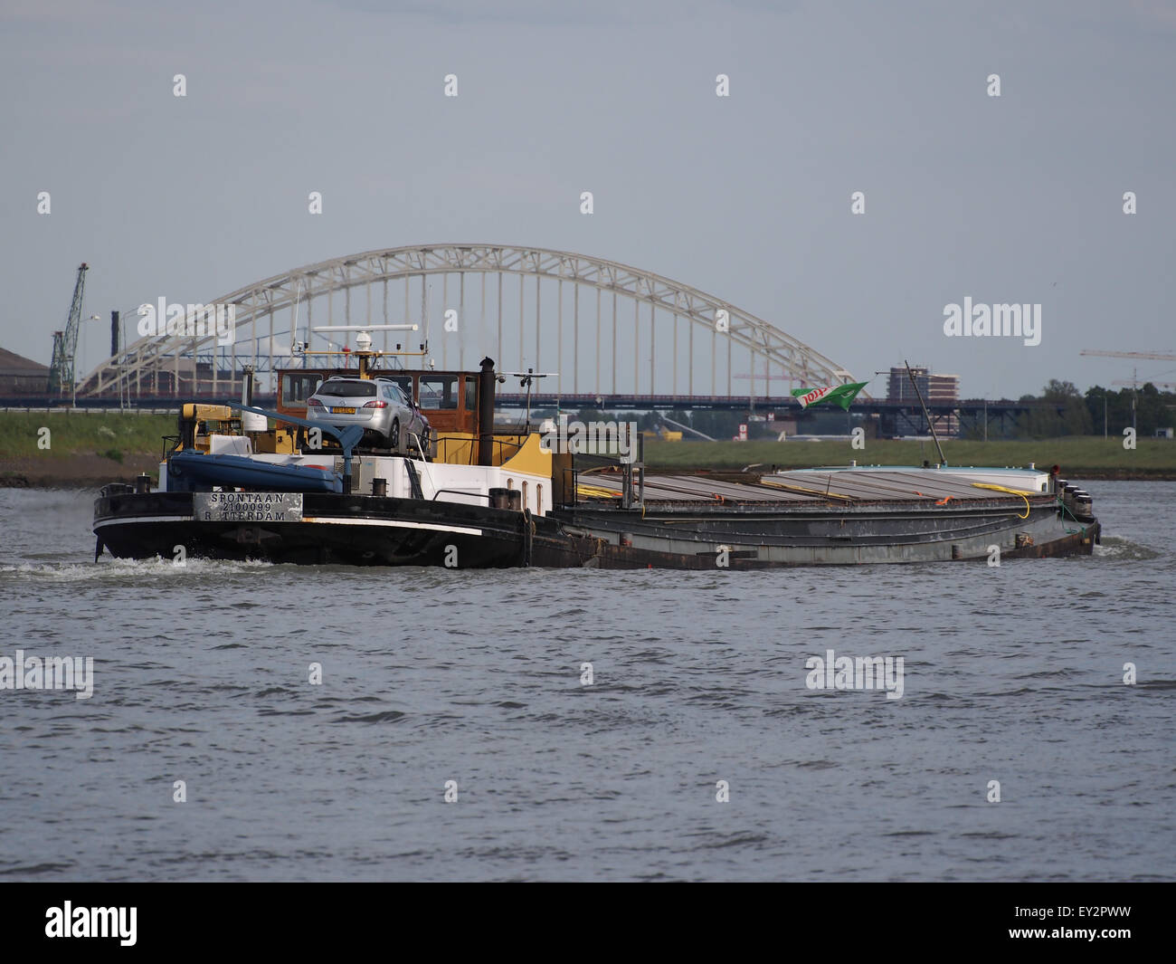 A photograph of the container ship ENI 02100099 navigating the Noord ...