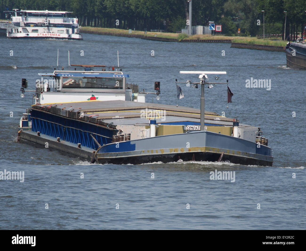 The container ship Sympathie, seen navigating the Amsterdam-Rijn Canal ...