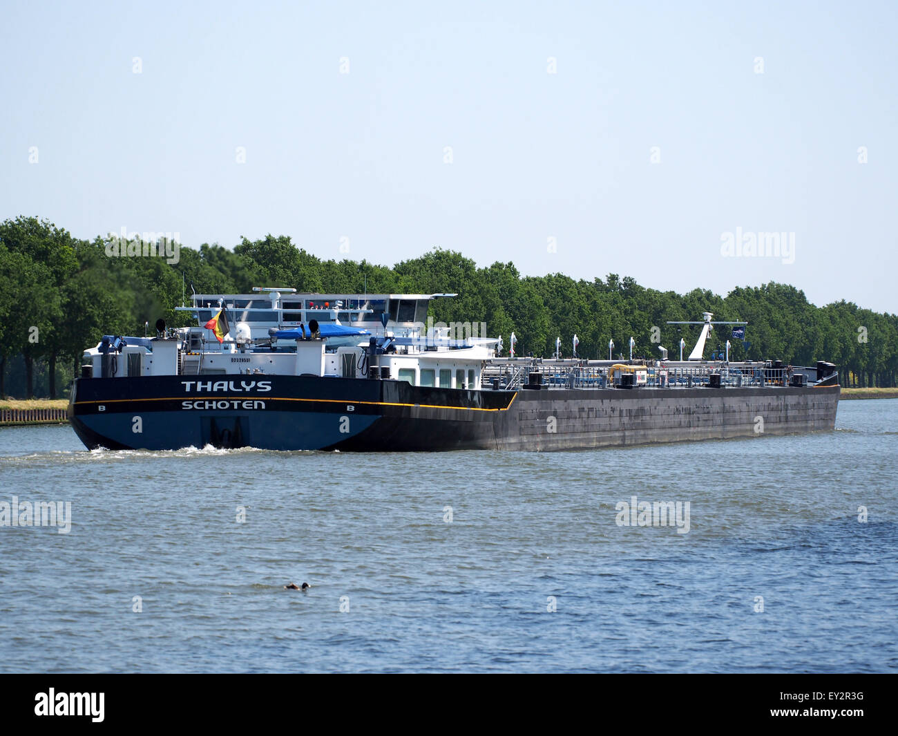This image showcases a Thalys container ship navigating the Amsterdam ...