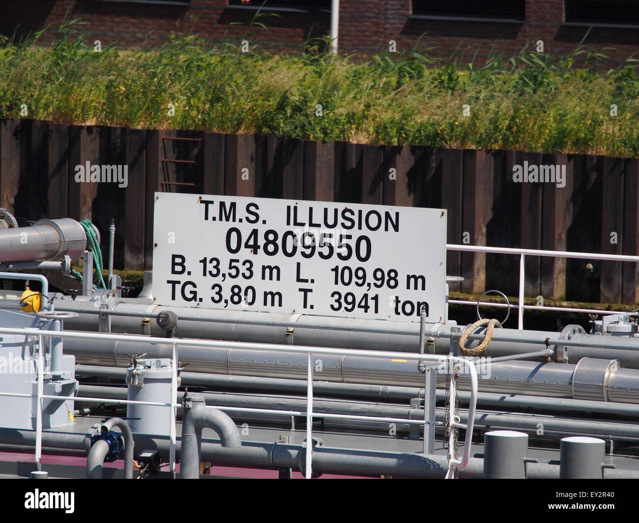 The image captures the 'TMS Illusion,' a chemical tanker navigating the ...