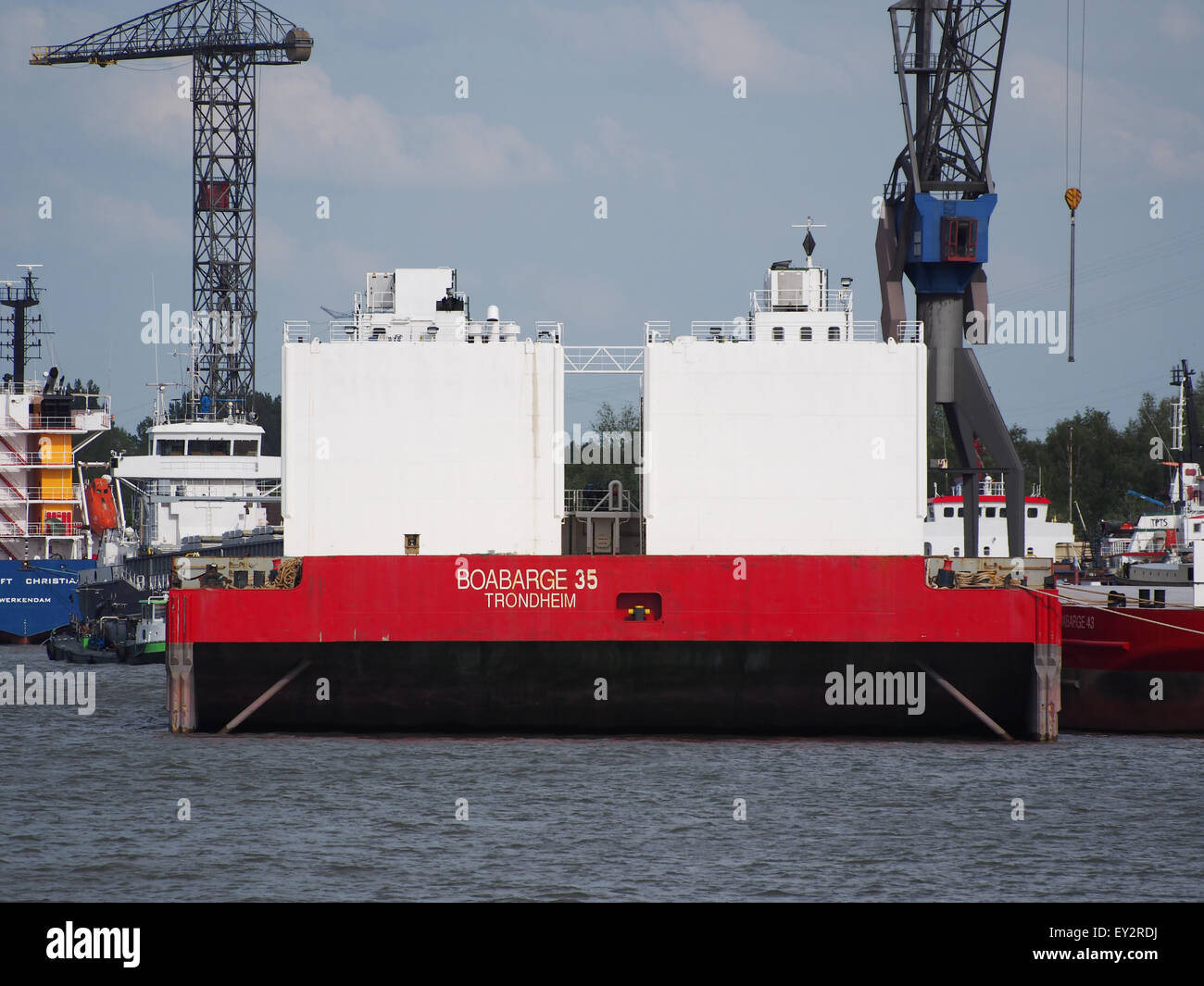 This image shows the Boabarge 35, a container ship navigating the ...