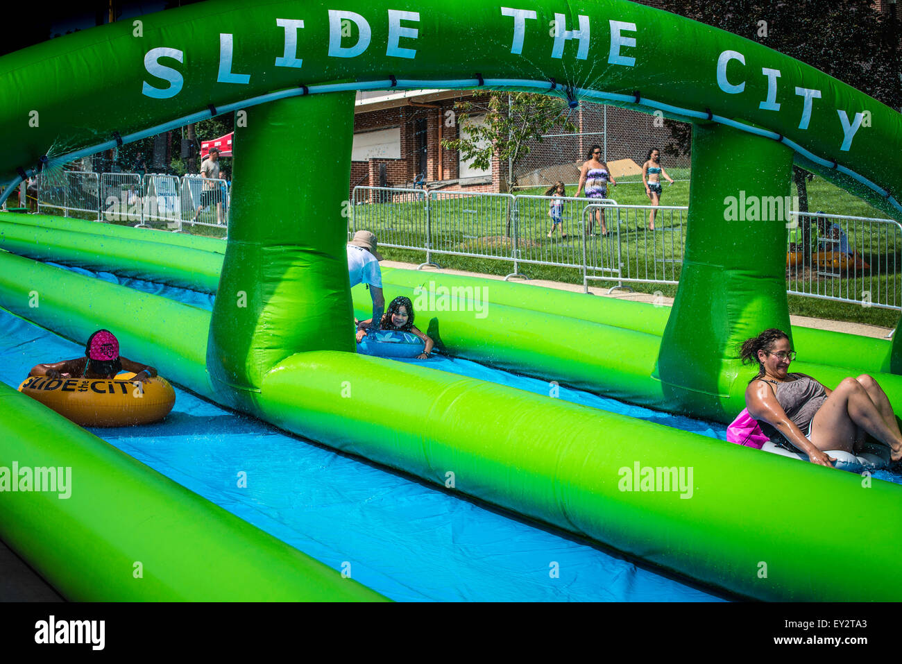 Children adult water slide hi-res stock photography and images - Alamy