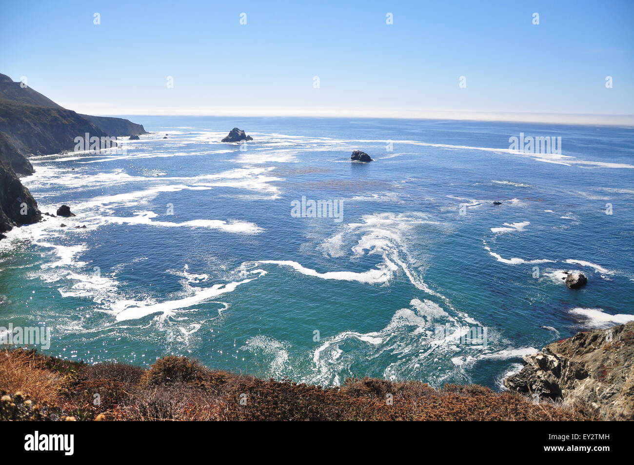 Big Sur swirling ocean Stock Photo - Alamy