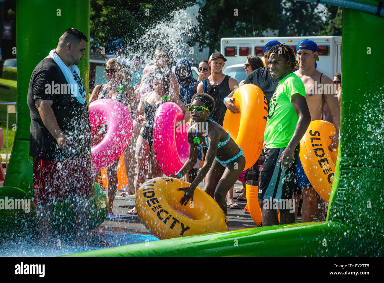 Children adult water slide hi-res stock photography and images - Alamy