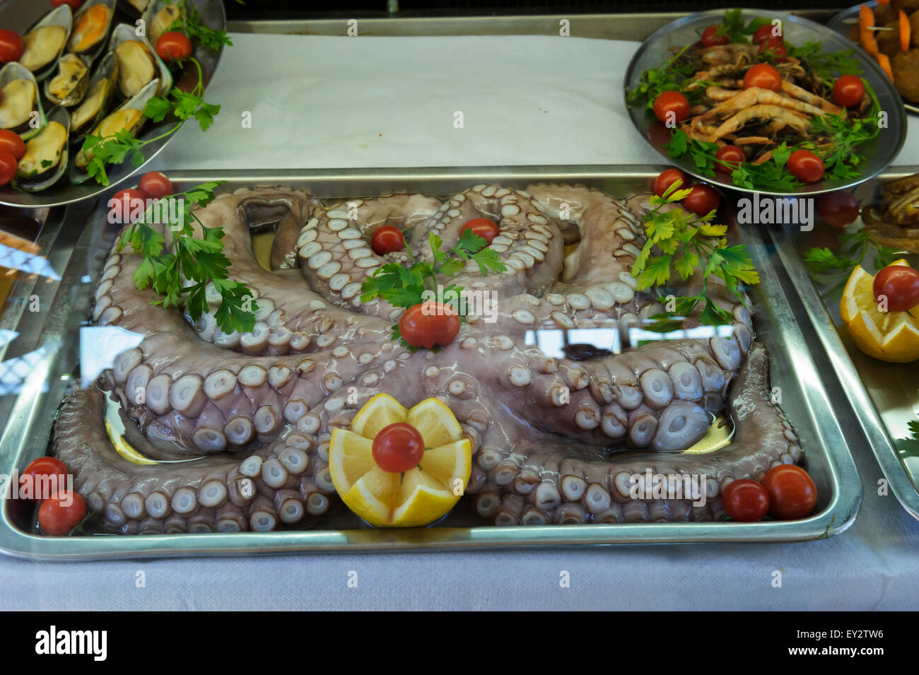 Uncooked octopus on display in a restaurant in Thirasia Island, Greece ...