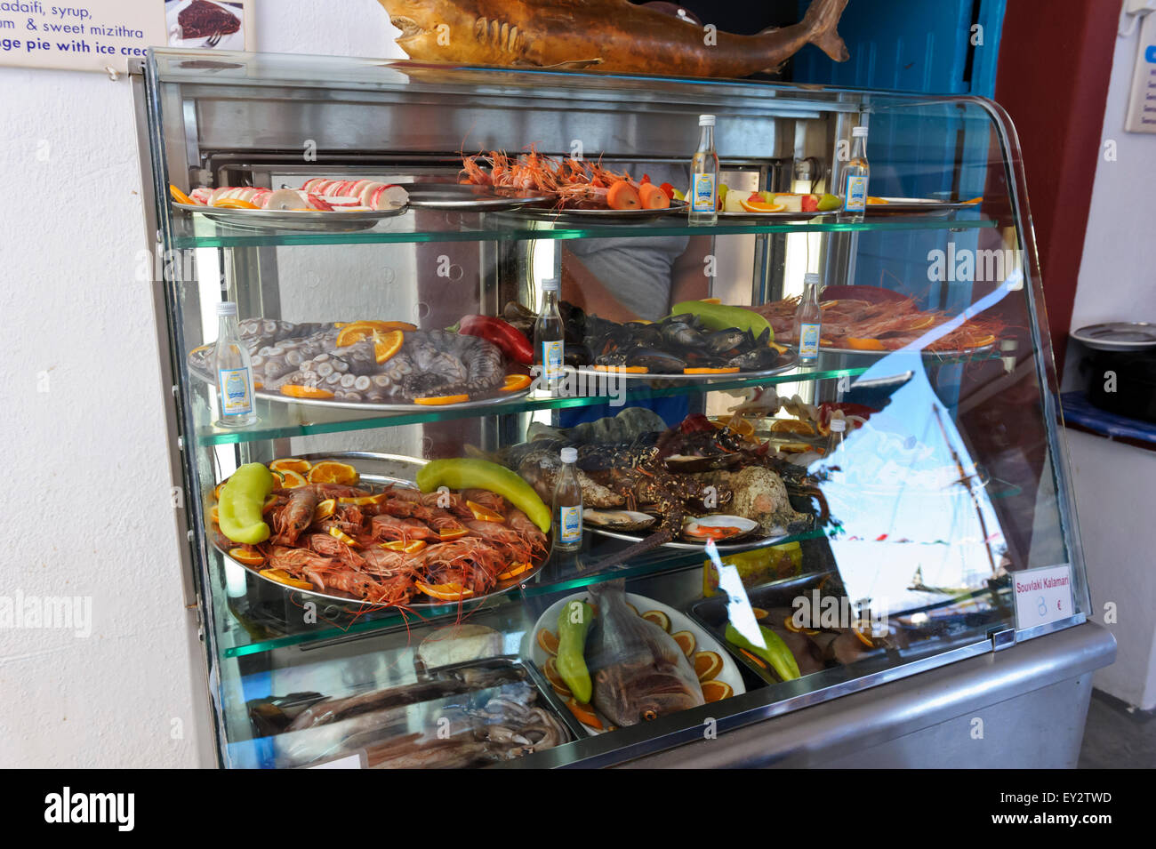 A selection of seafood on display in a restaurant on Thirasia island ...