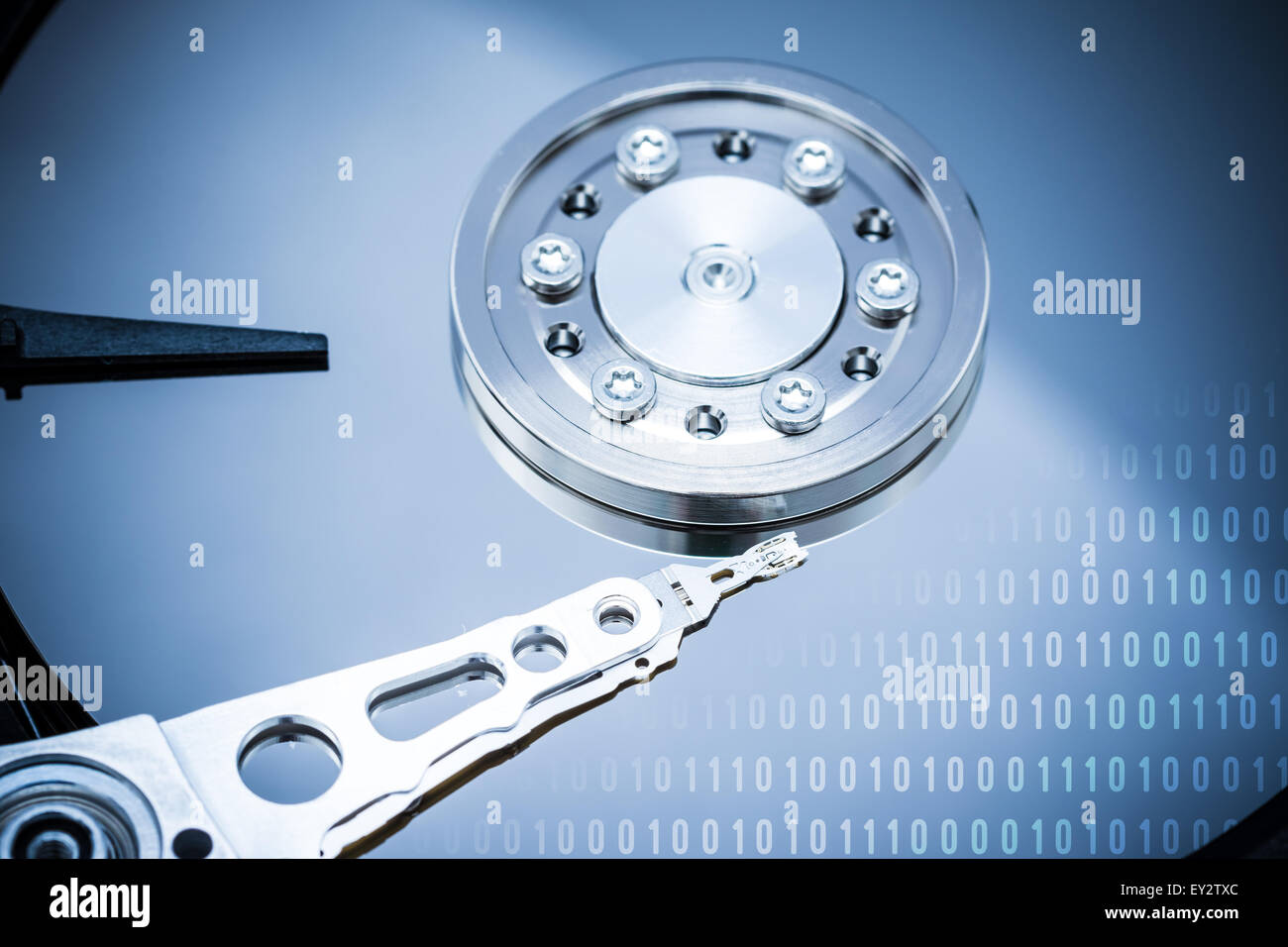 Computer Hard Disk Drive Internals And Binary Number Code Stock Photo - Alamy