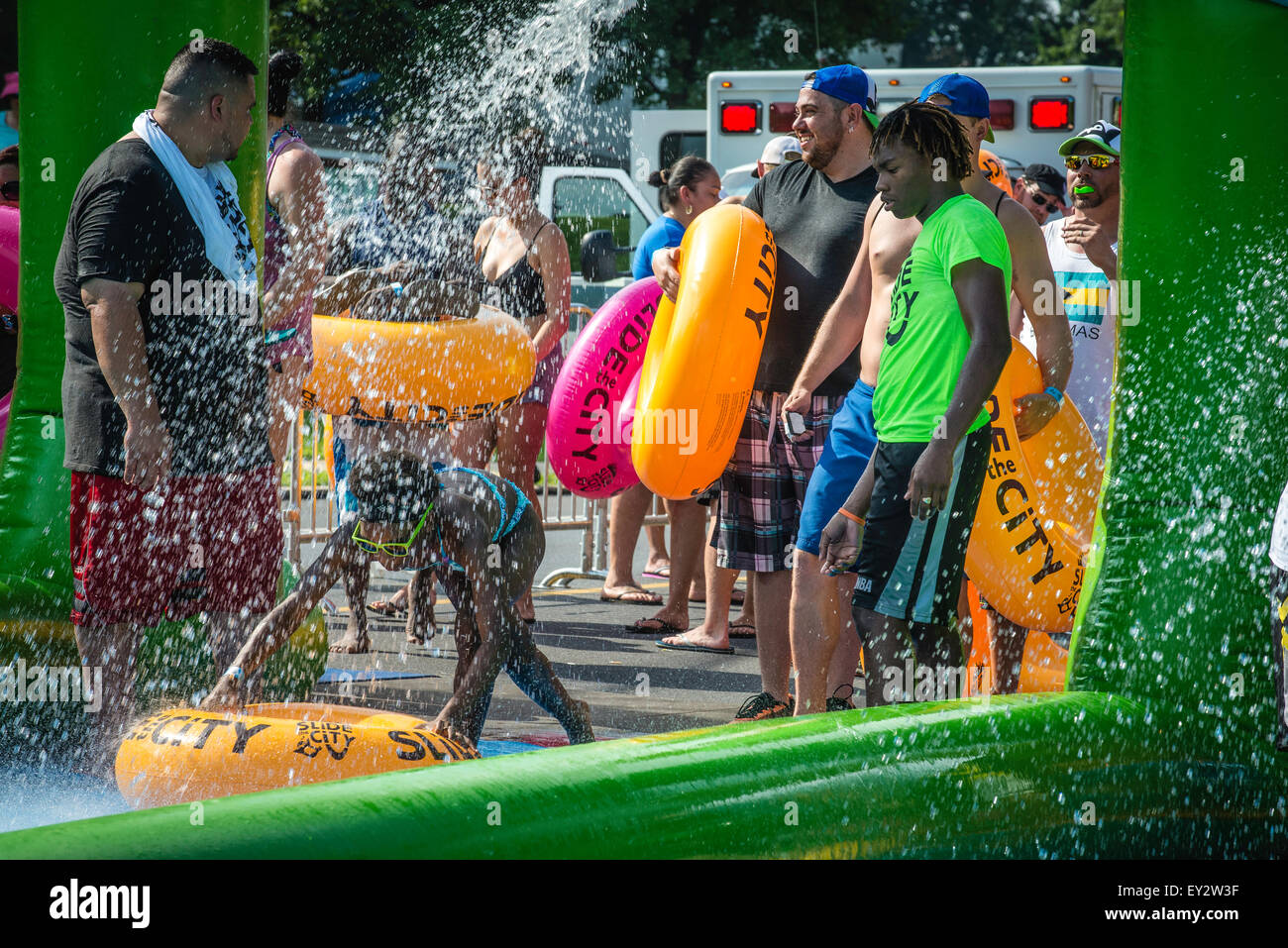 Slide the City, summer event water slide. Fun time during hot, humid ...