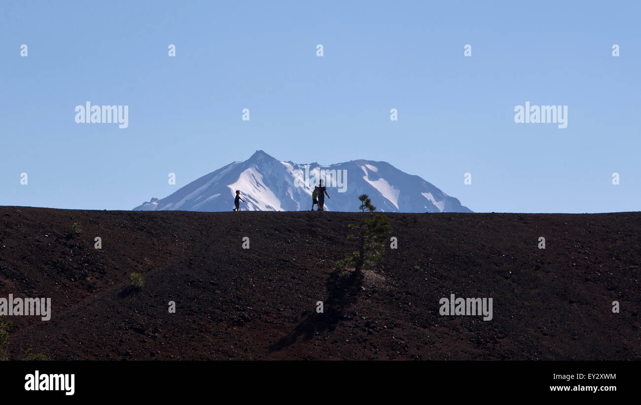 Father and two children hike along the rim of Stock Photo - Alamy