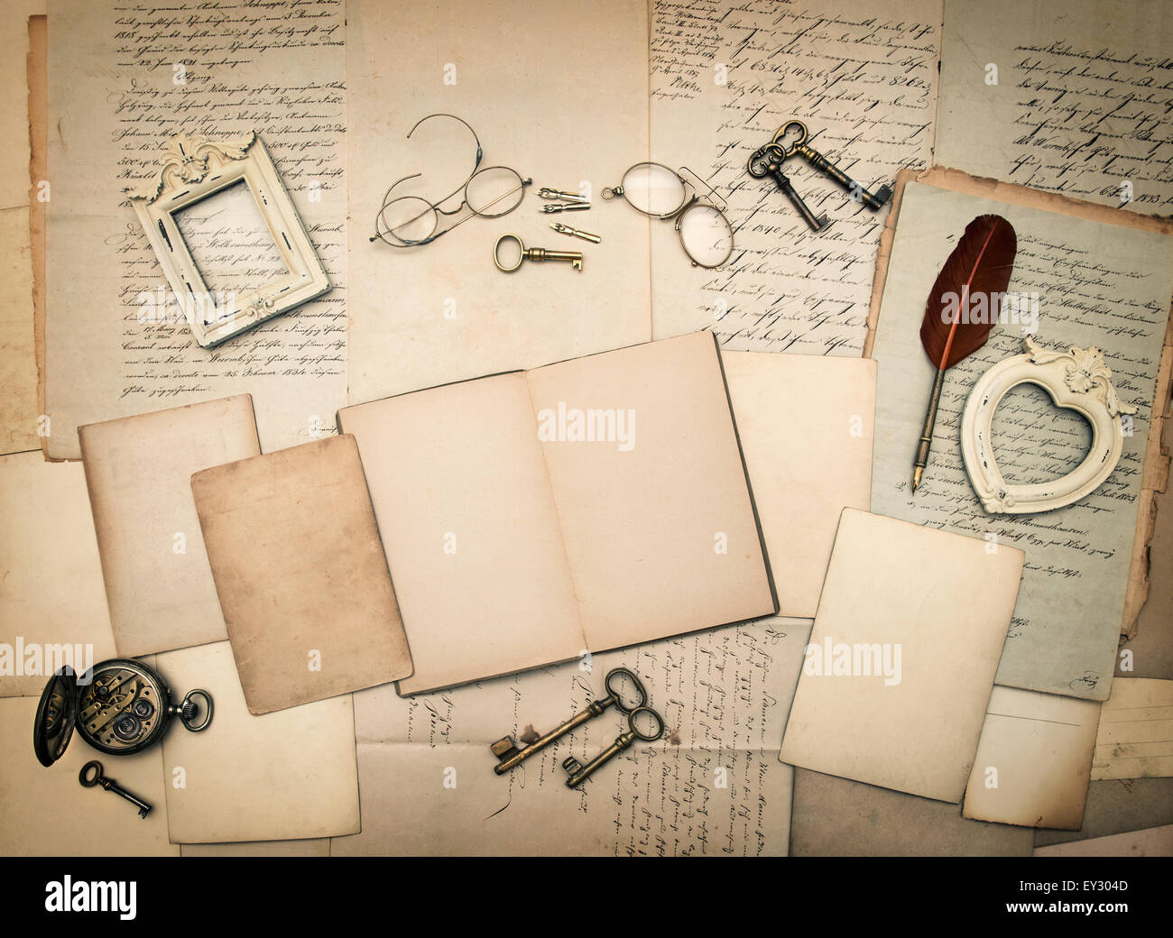 Old letters and photo frames. Vintage things, handwritten documents ...