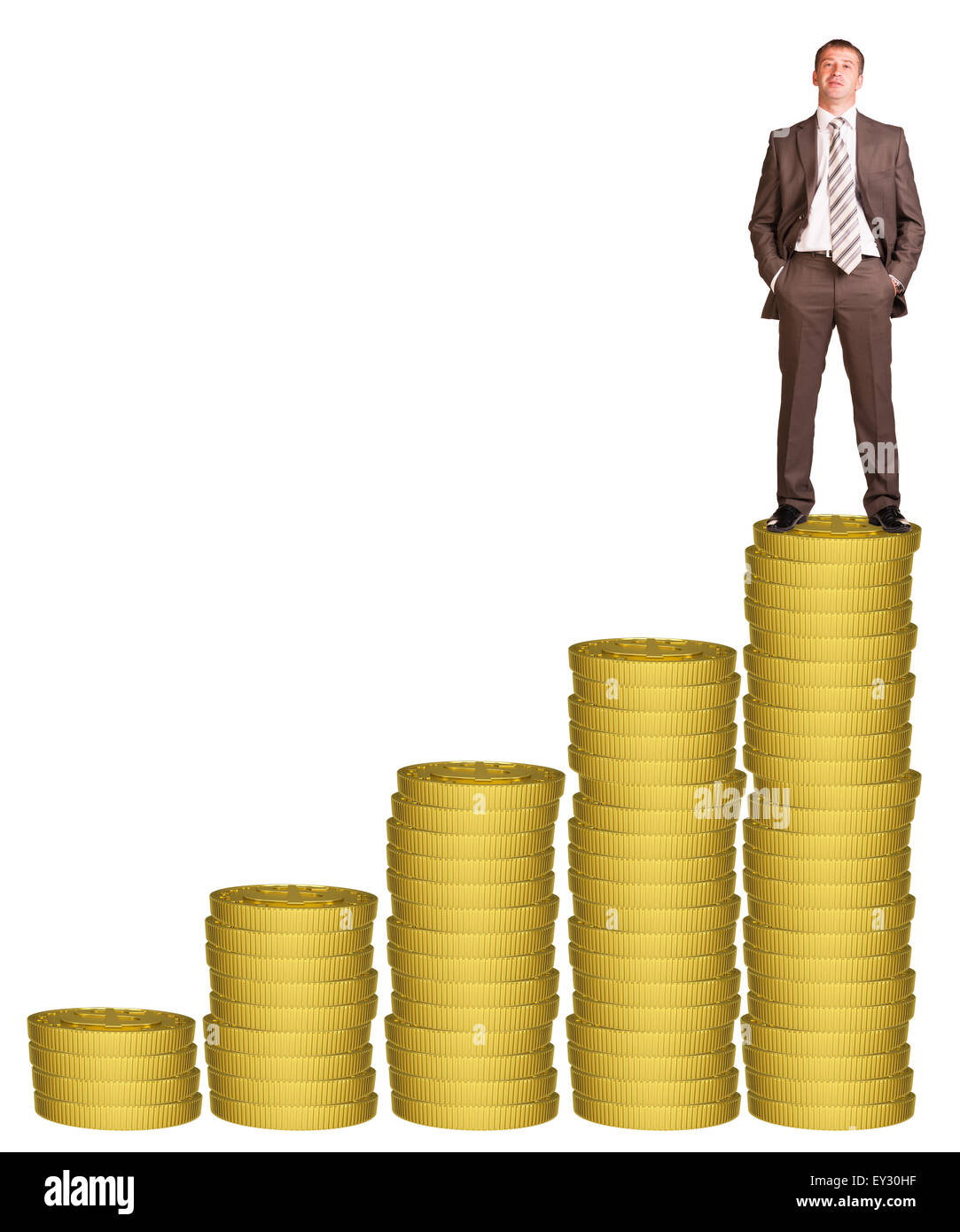 Businessman on golden coins stack Stock Photo - Alamy