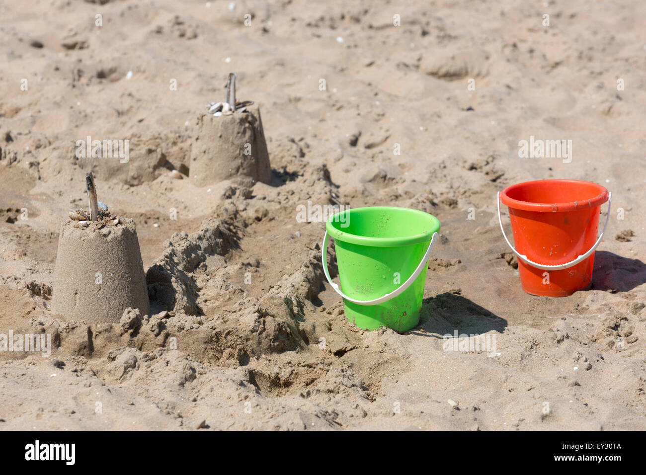 Buckets and sand castles on the sandy beach of Scheveningen, Holland ...