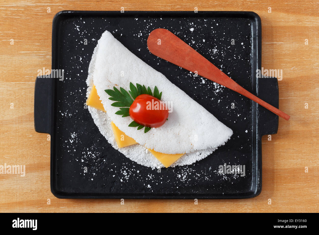 Cooking casabe (bammy, beiju, bob, biju) - flatbread made from cassava ...