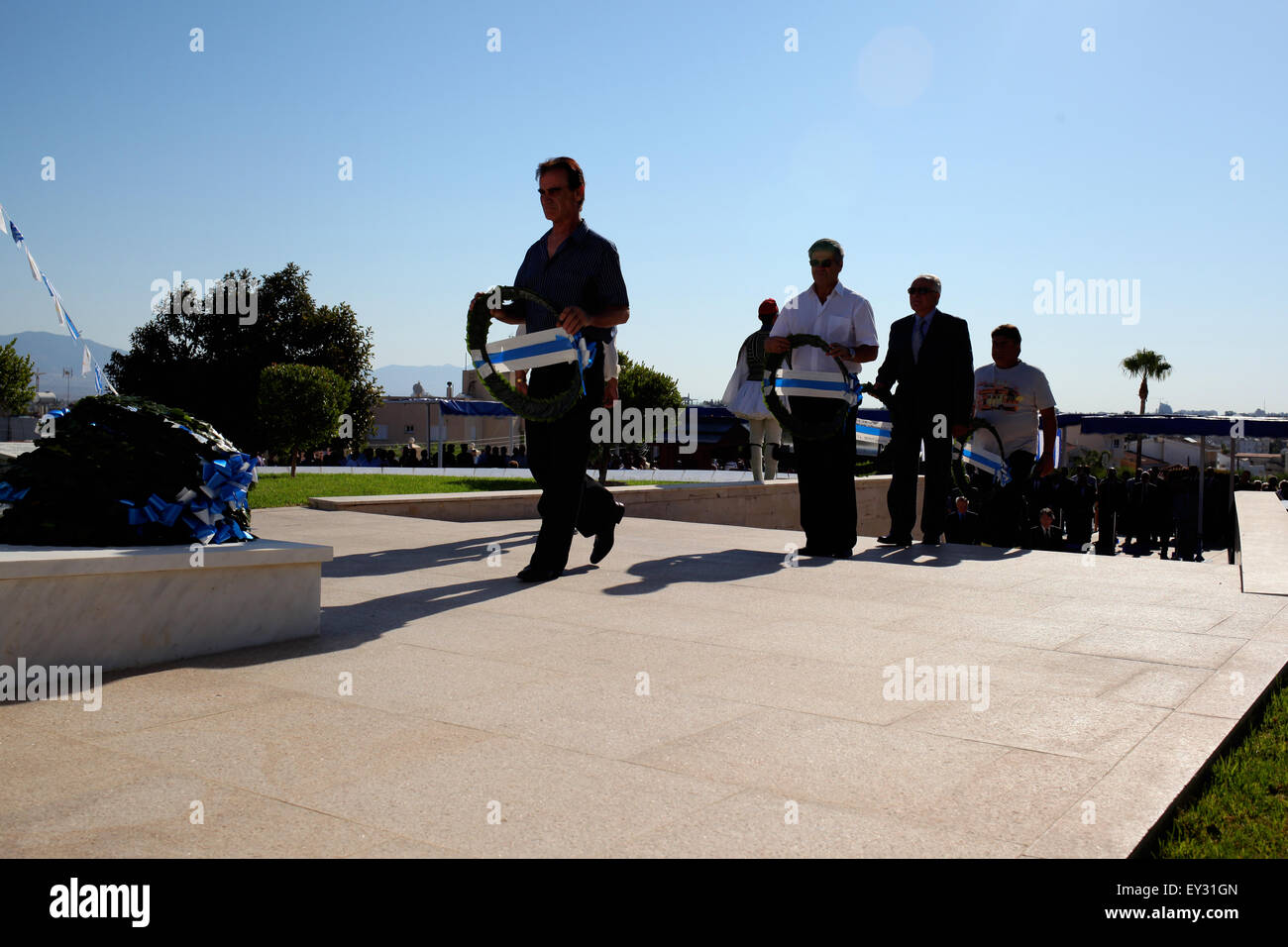 Larnaca, Cyprus. 20th July, 2015. People are placing wreaths in a the ...