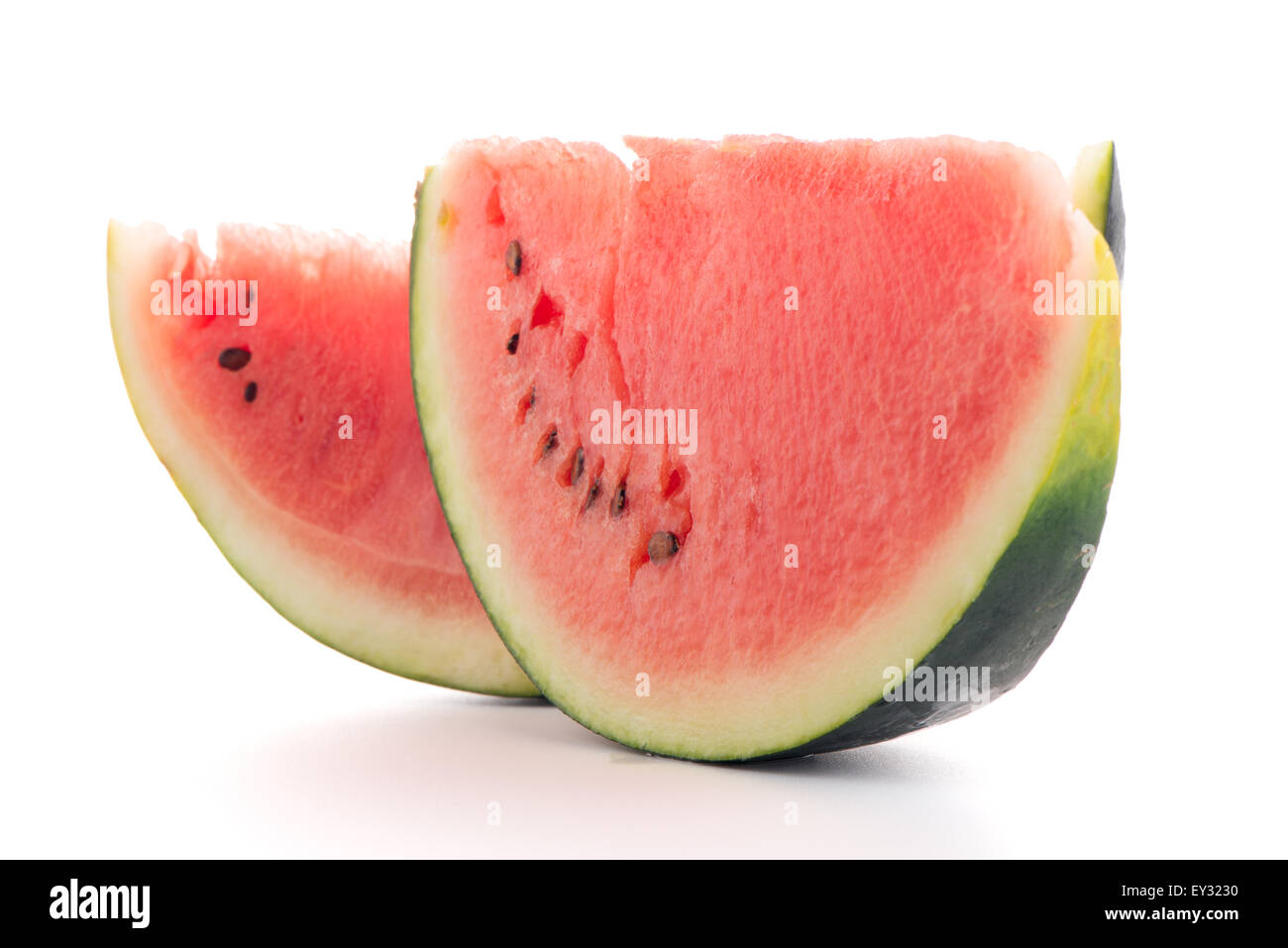Closeup of watermelon slices on white background Stock Photo - Alamy