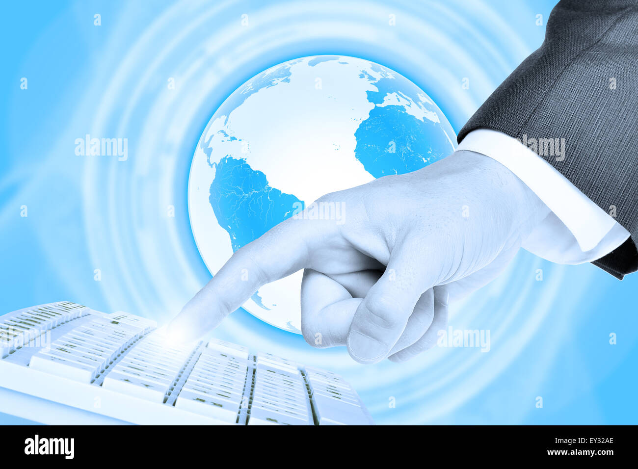 Businessmans finger touching keyboard Stock Photo - Alamy