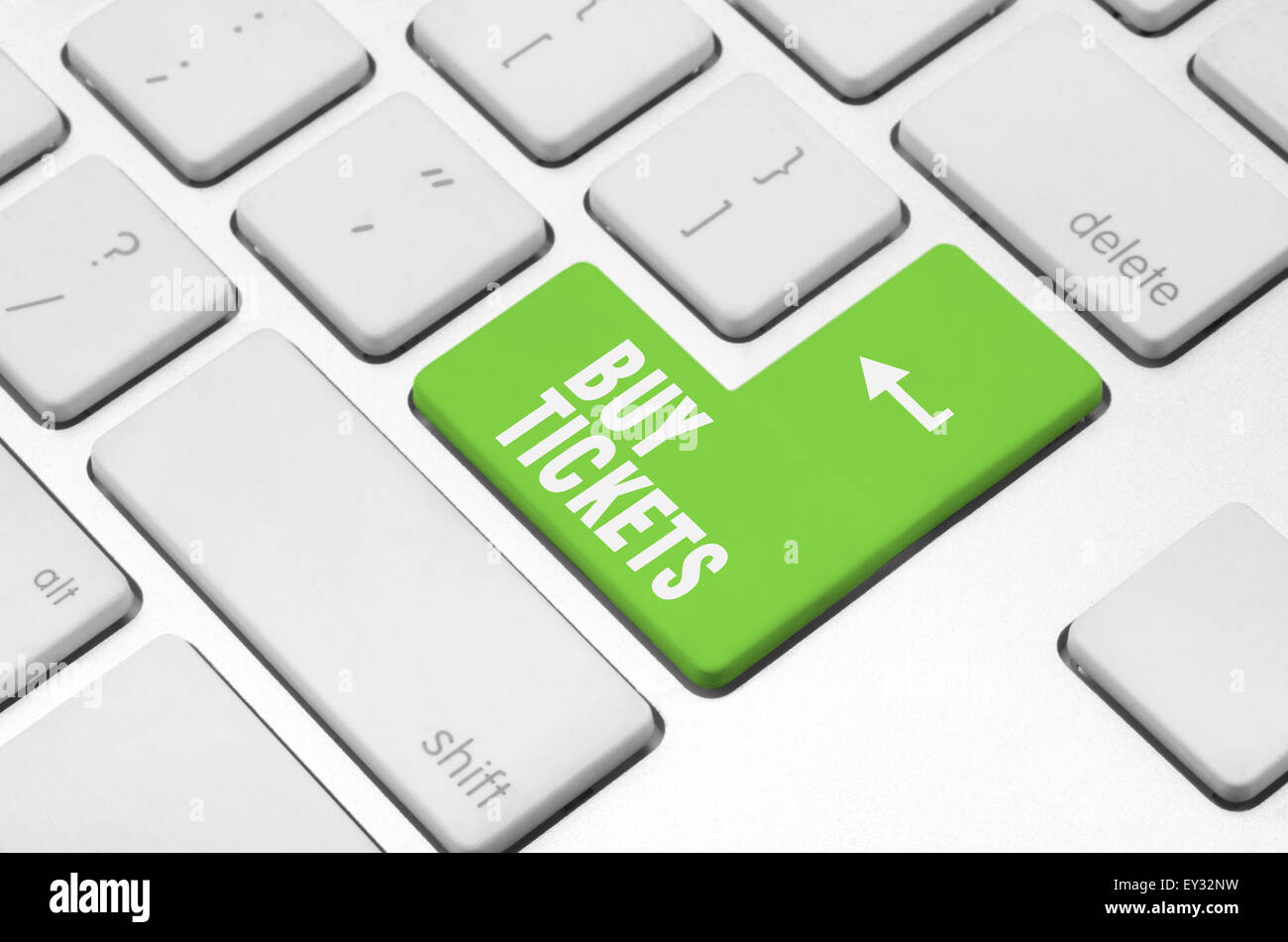 Buy tickets on the computer keyboard Stock Photo - Alamy