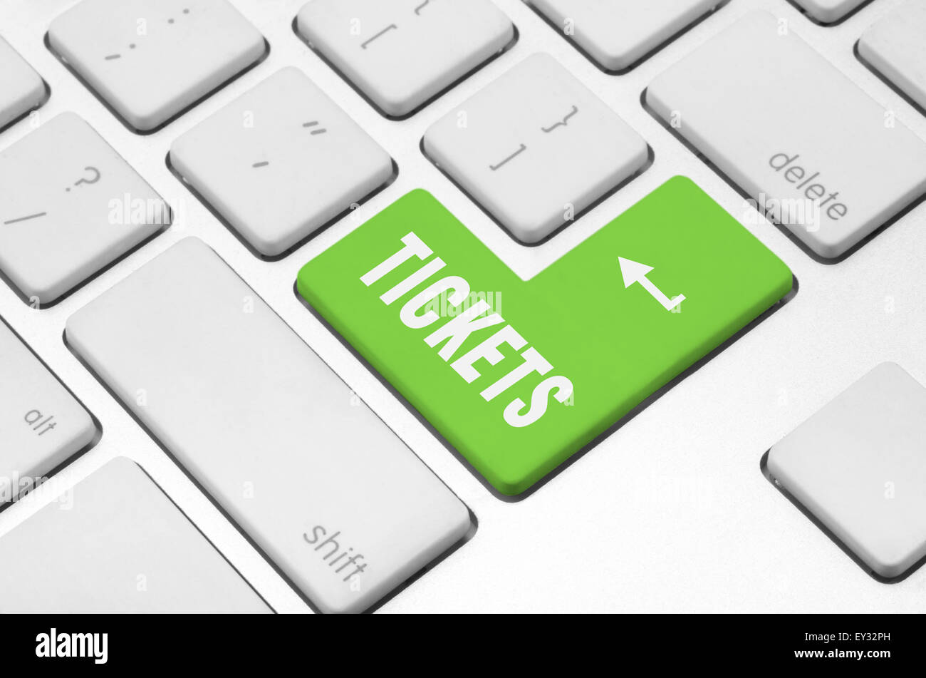 Buy tickets on the computer keyboard Stock Photo - Alamy