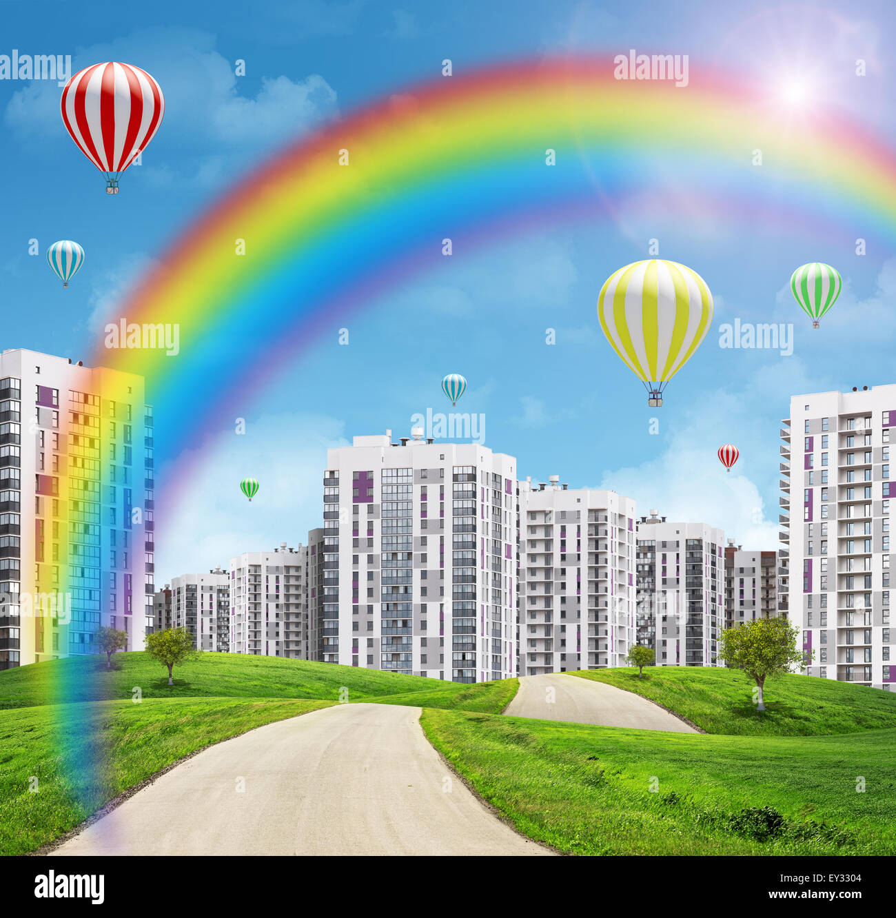 Cityscape on green field with rainbow and trees Stock Photo - Alamy